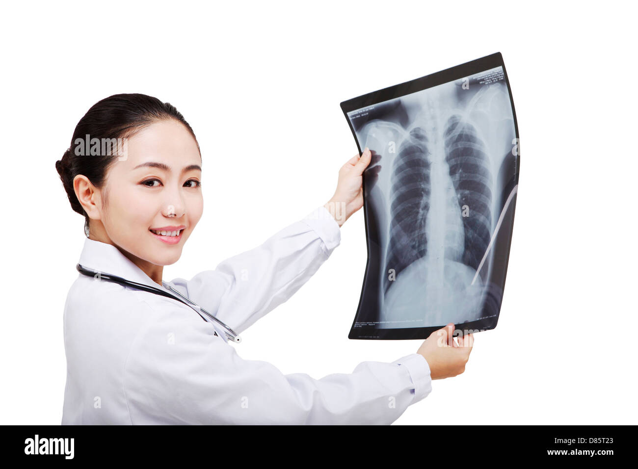 The young female doctor checking X ray film Stock Photo - Alamy