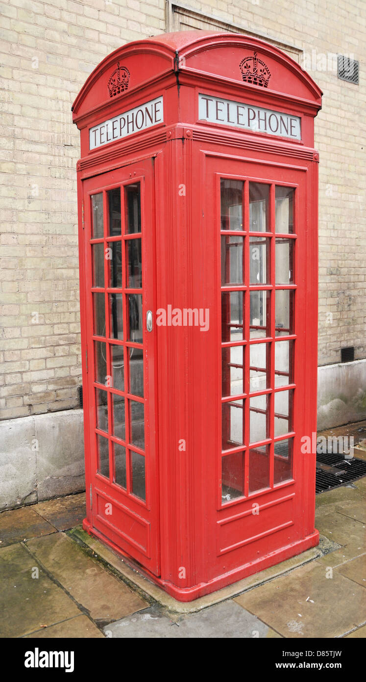 Old style red British telephone box Stock Photo - Alamy