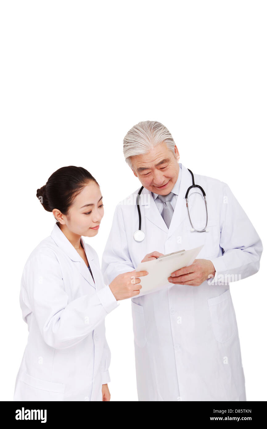 Two doctors discuss hi-res stock photography and images - Alamy