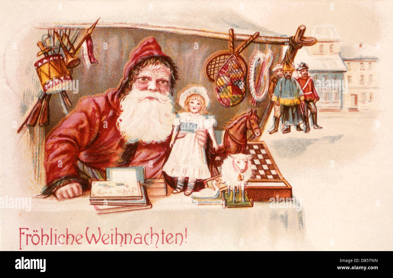 Father Christmas with toys Stock Photo - Alamy