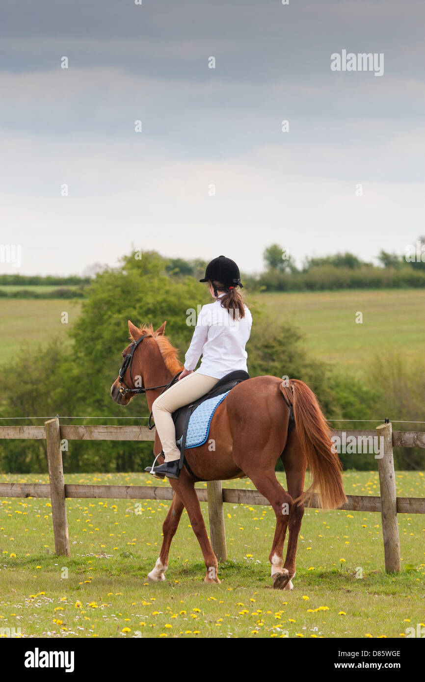 Young girl having a horse riding lesson at Hesteyri Horses, Forest of ...