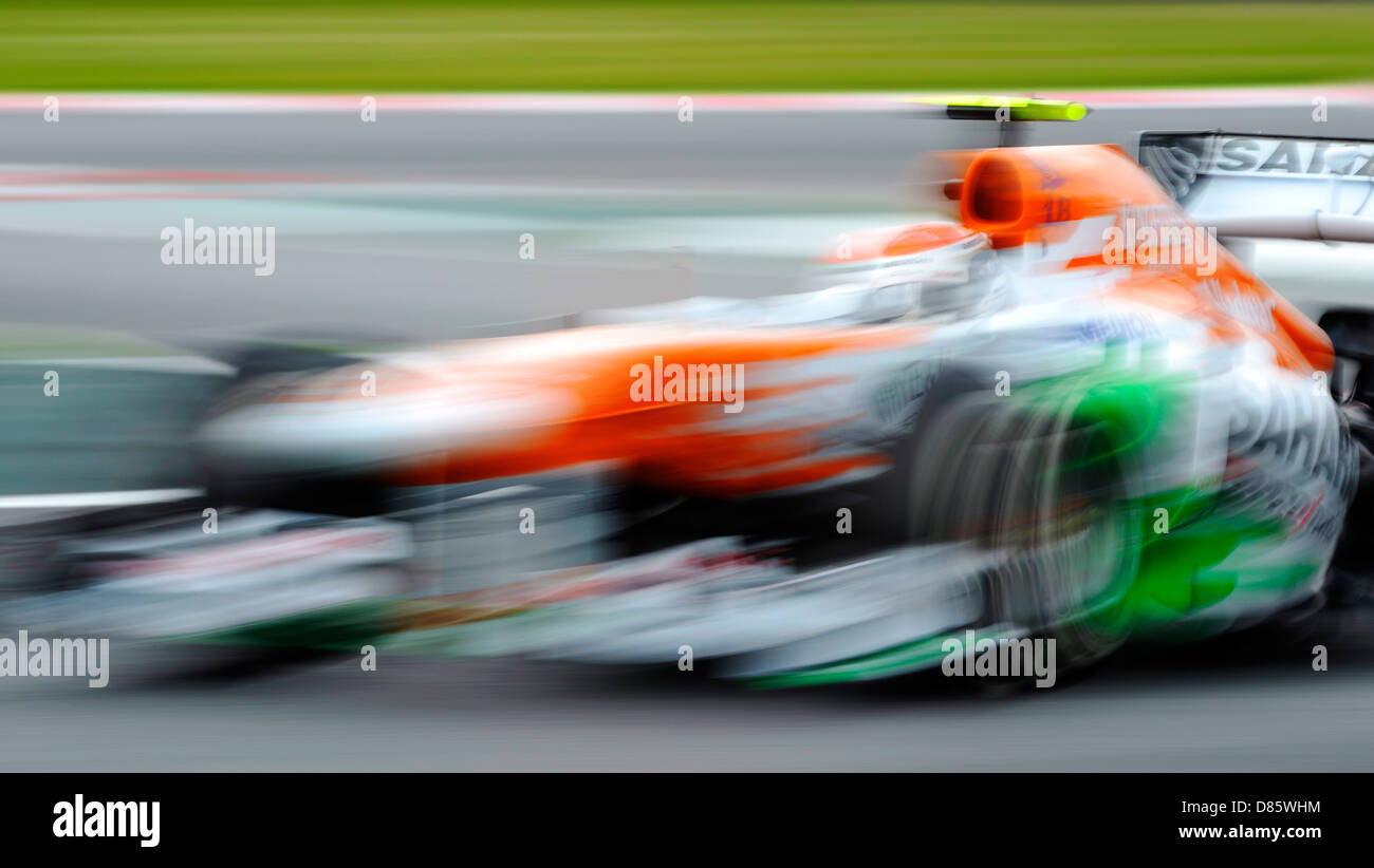 blurred Force India Formula One race car during the Spanish Formula One ...