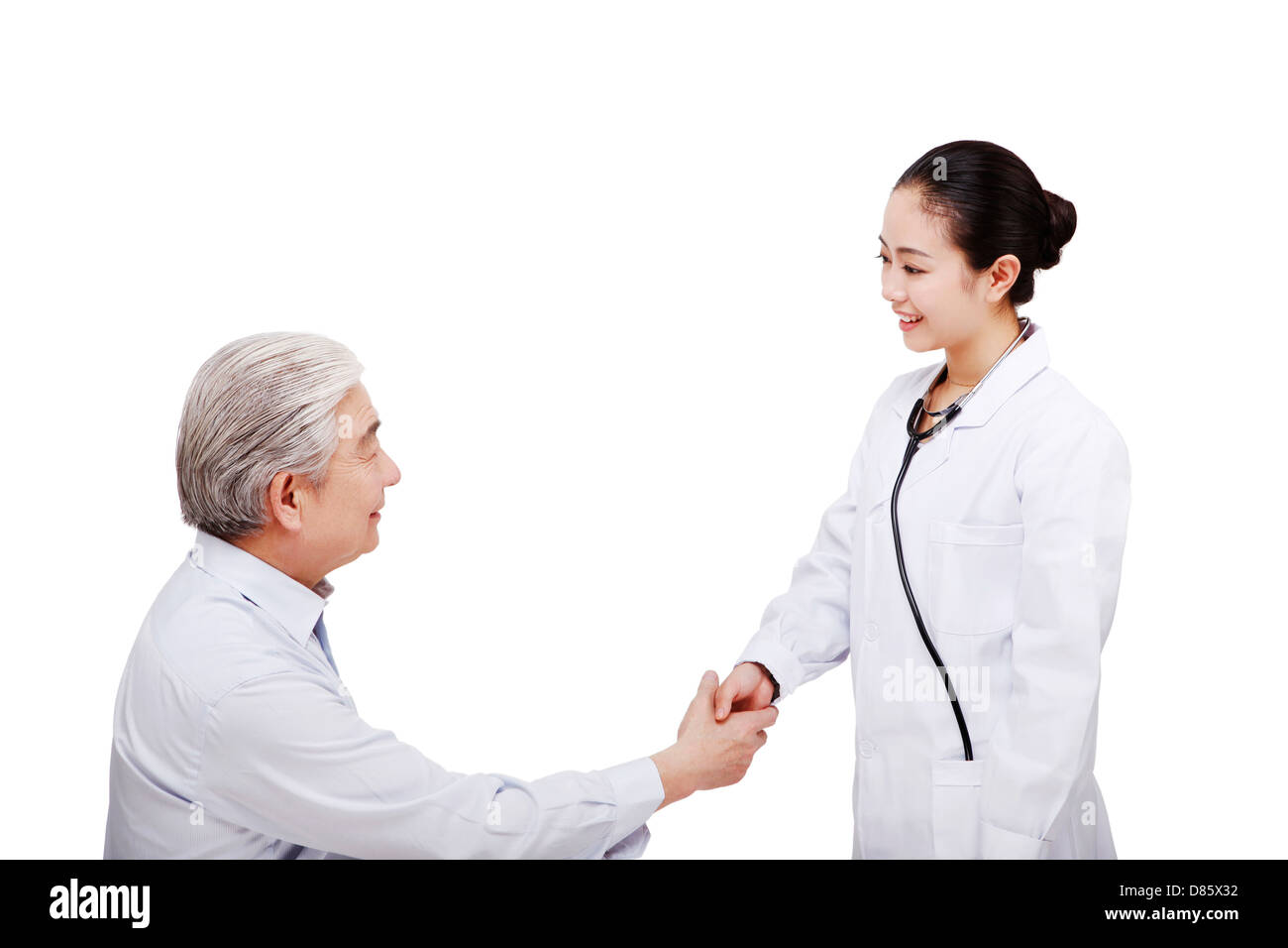 The doctor and the patient to shake hands Stock Photo - Alamy
