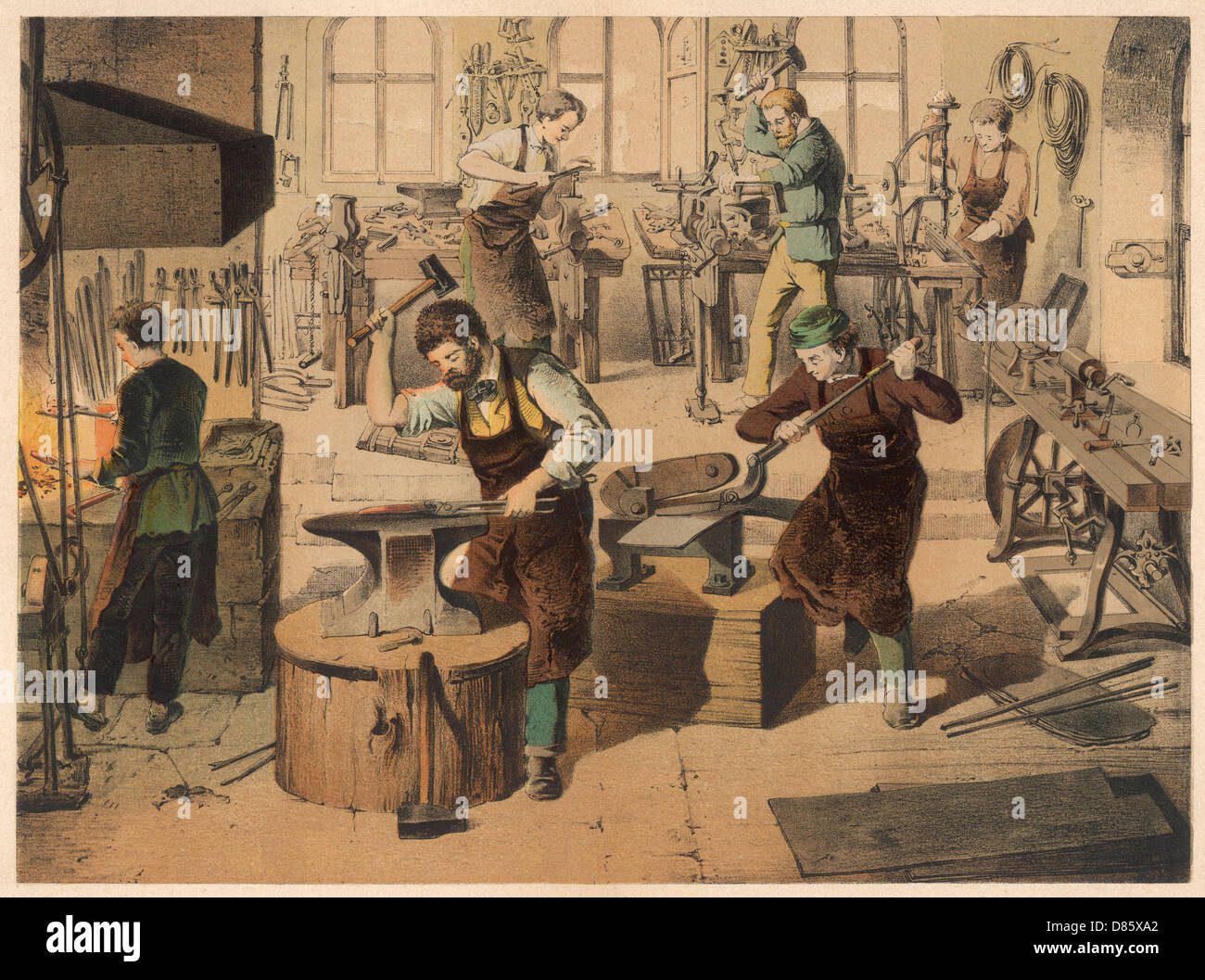 Blacksmith Working In His Smithy Workshop Stock Photo - Alamy