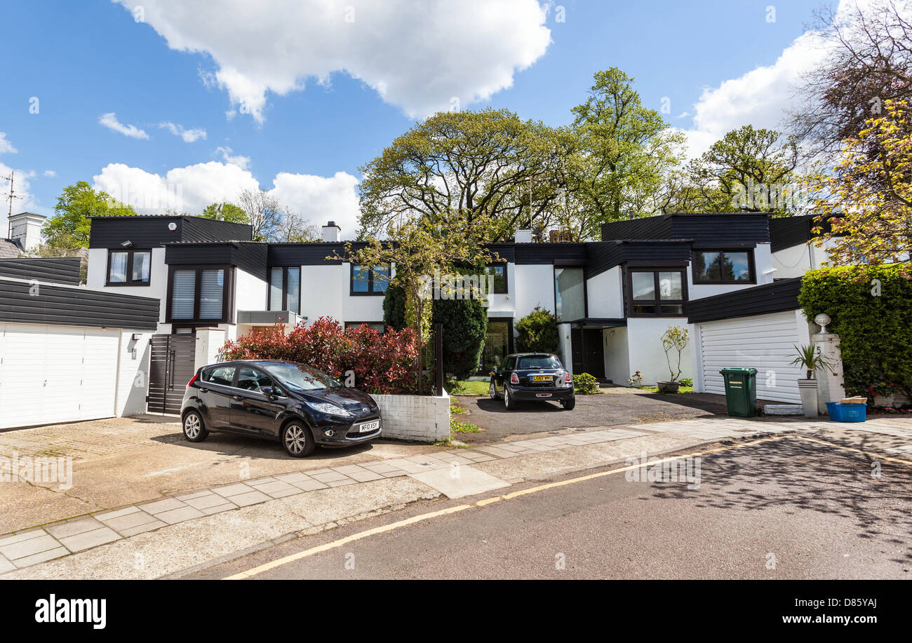 Row of houses designed by architect Ted Levy, London, England, UK Stock ...