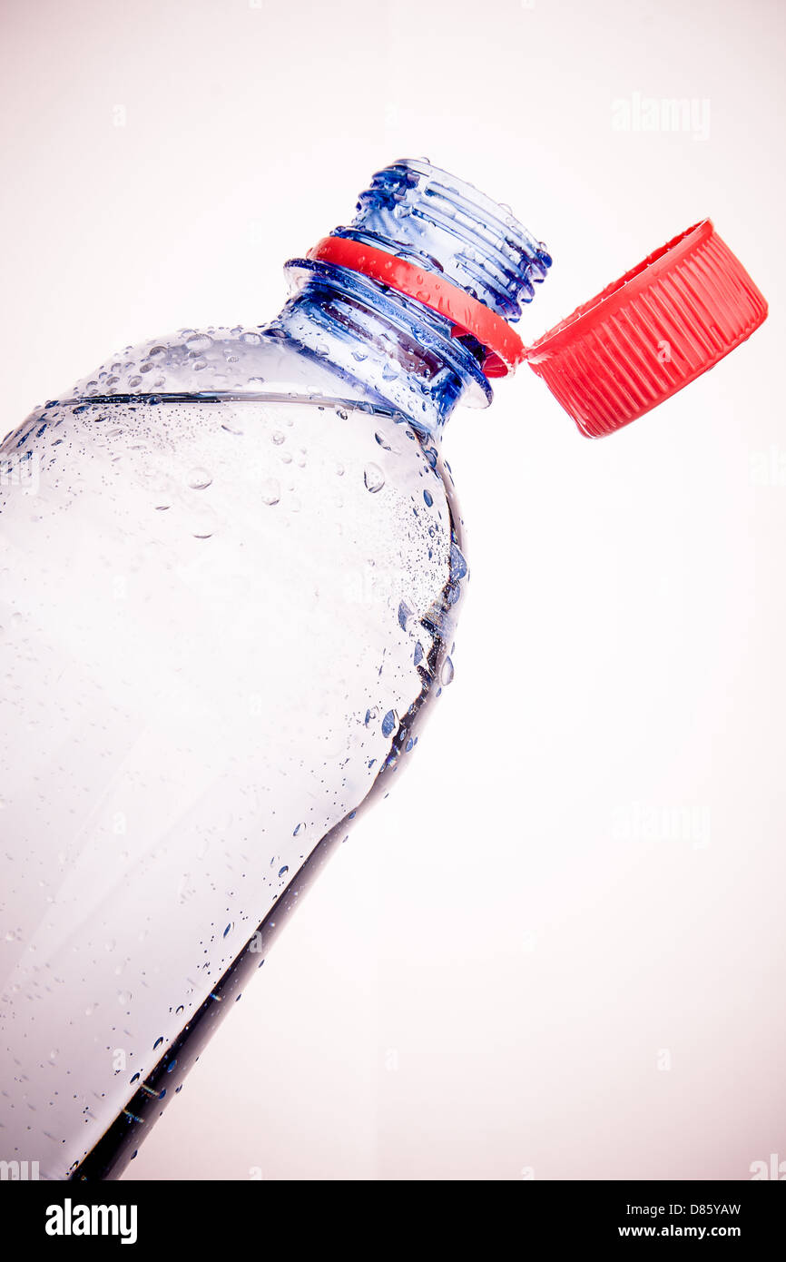 Plastic bottle of drinking water isolated on white Stock Photo - Alamy