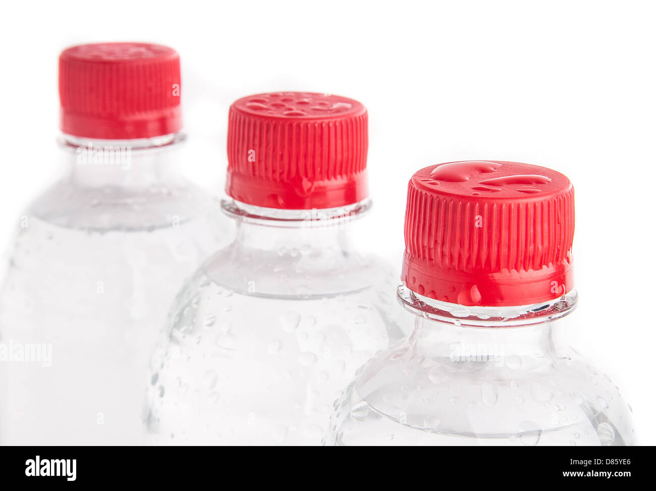 Plastic bottles of drinking water isolated Stock Photo - Alamy