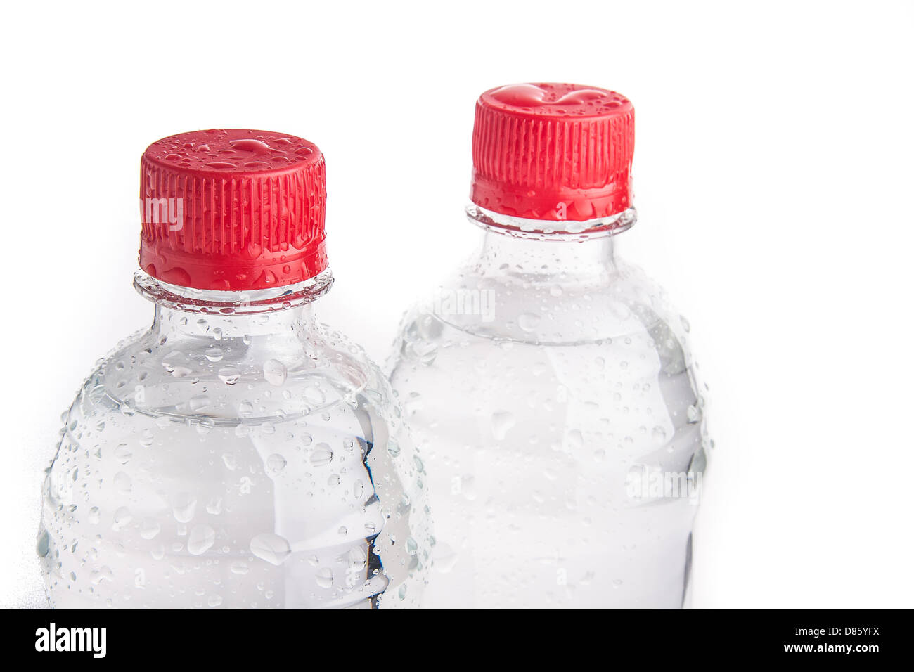 Plastic bottles of drinking water isolated Stock Photo - Alamy