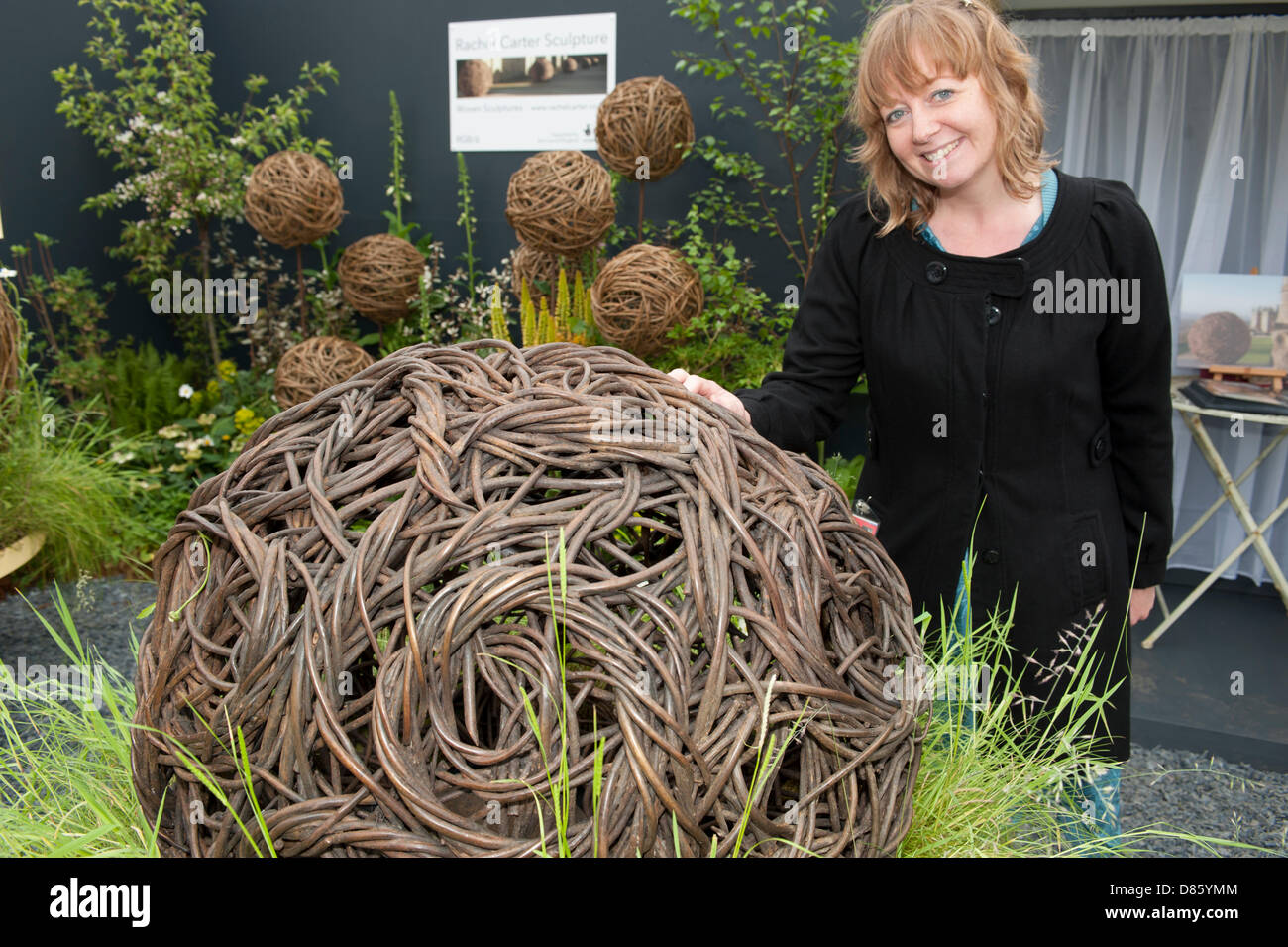 20.5.2013, London, UK. Sculptor Rachel Carter beside her Bronze wicker ...