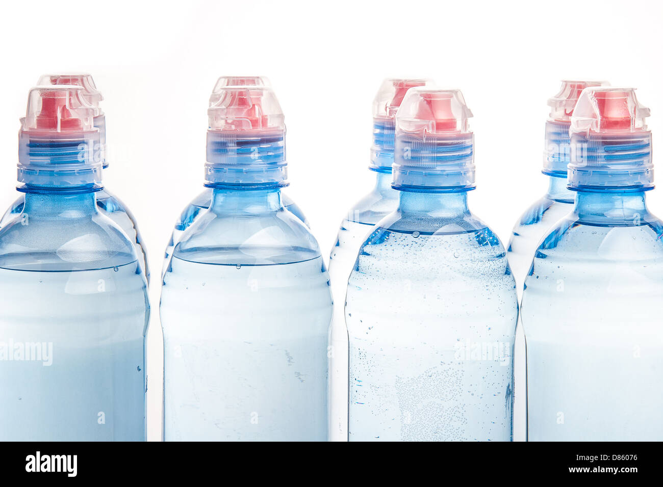 Plastic bottle of drinking water isolated on white Stock Photo - Alamy