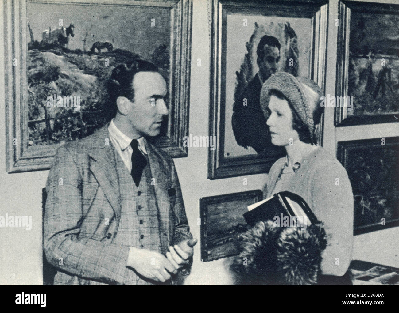 Edward Seago(1910 - 1974) and Lady Melchett at his exhibitio Stock ...