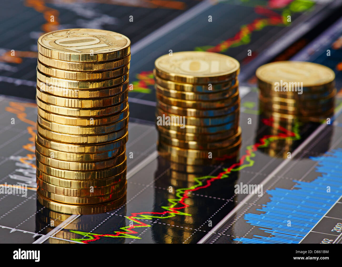Down trend stacks of coins and financial chart as the background Stock ...