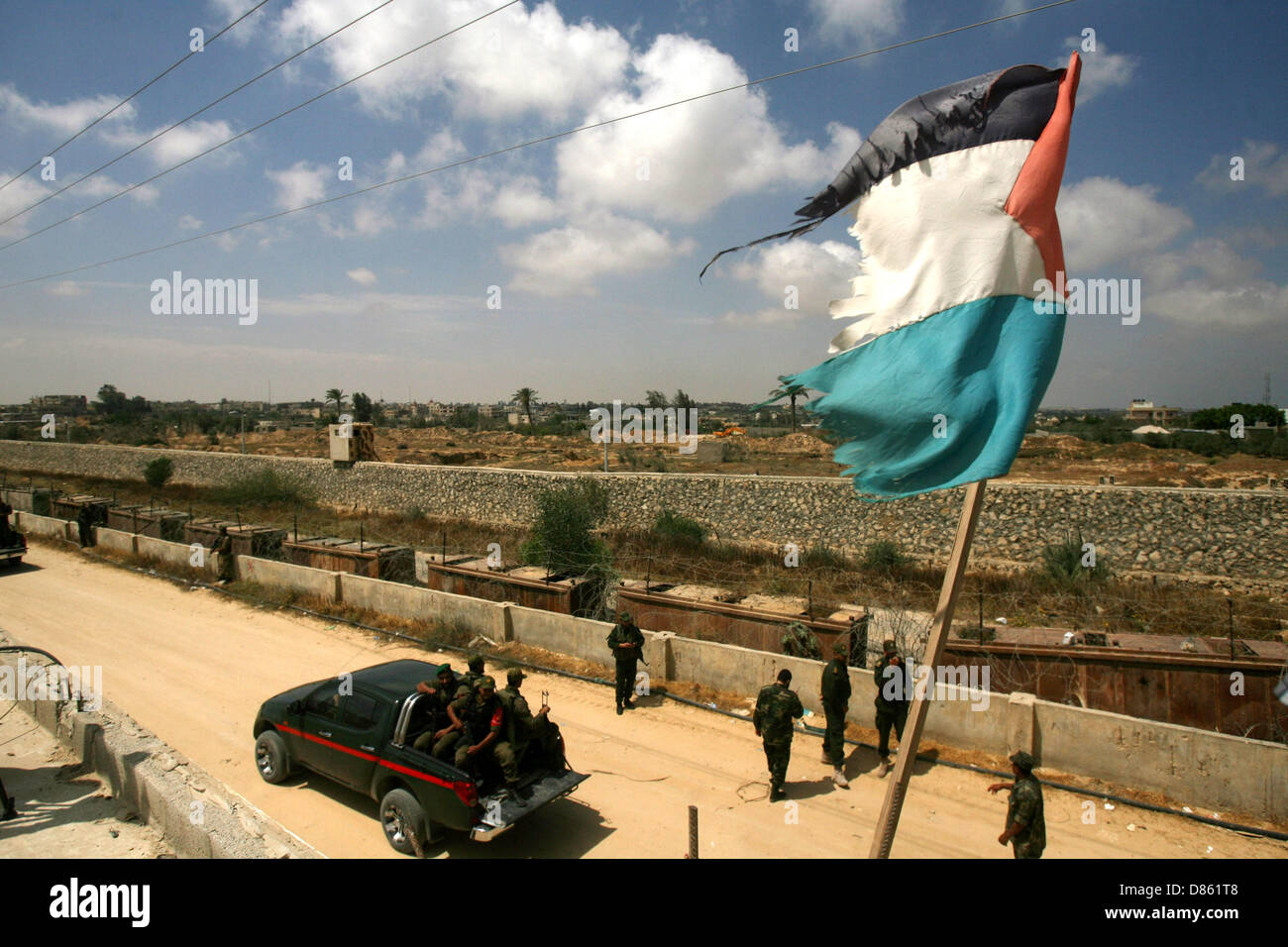 May 20, 2013 - Rafah, Gaza Strip - A Palestinian flag flutters as ...