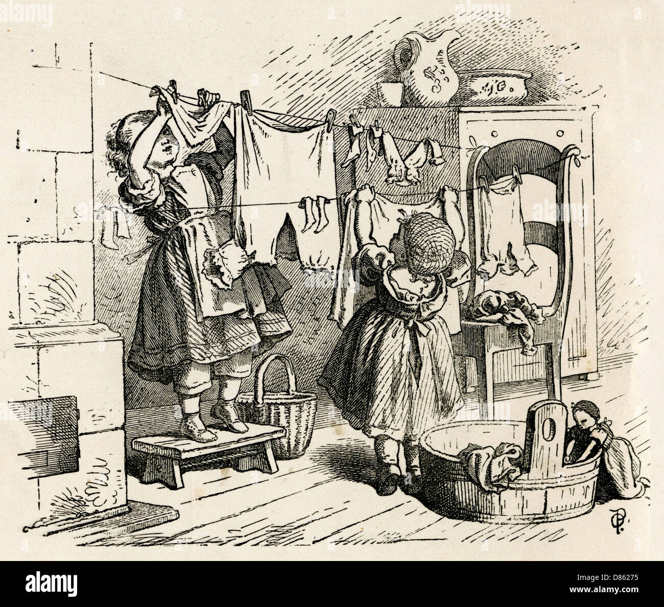 Putting clothes on washing line hi-res stock photography and images - Alamy