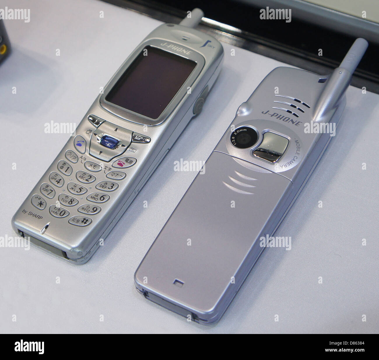 A stock image of the Sharp J-SH04, a mobile phone model released in 2011, featuring a sleek ...
