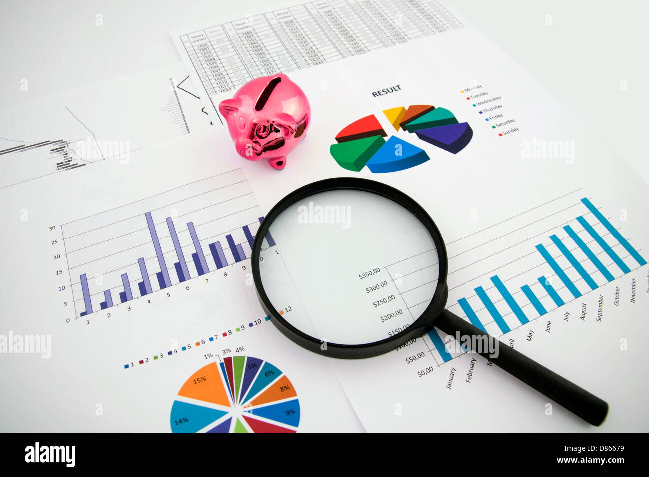 Magnifier on business background. Use for company strategic behavior ...