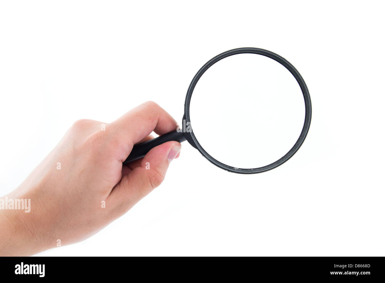 Hand holding magnifier isolated on white Stock Photo - Alamy