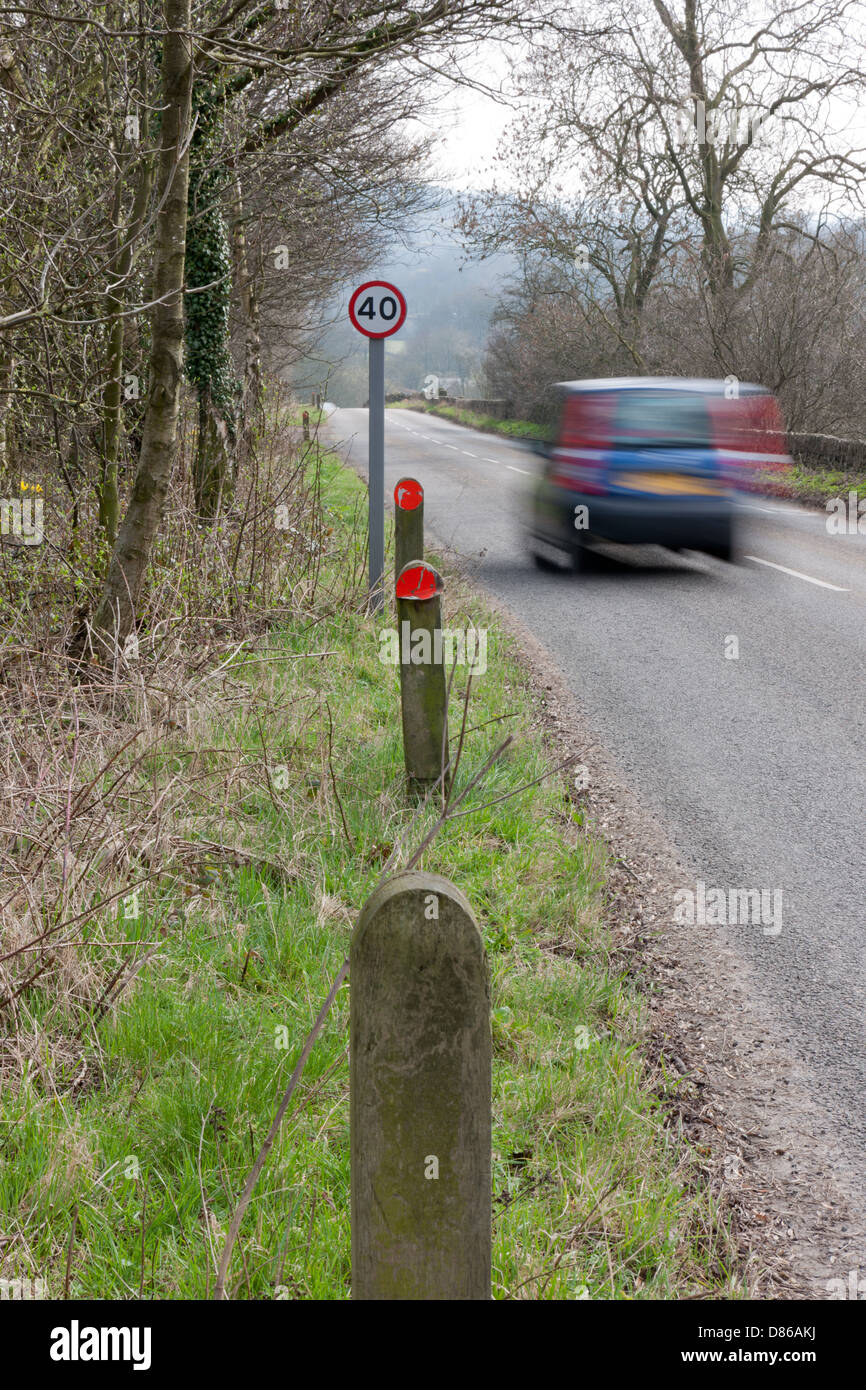 A car speeds down a country lane into a 40mph restricted zone Stock ...