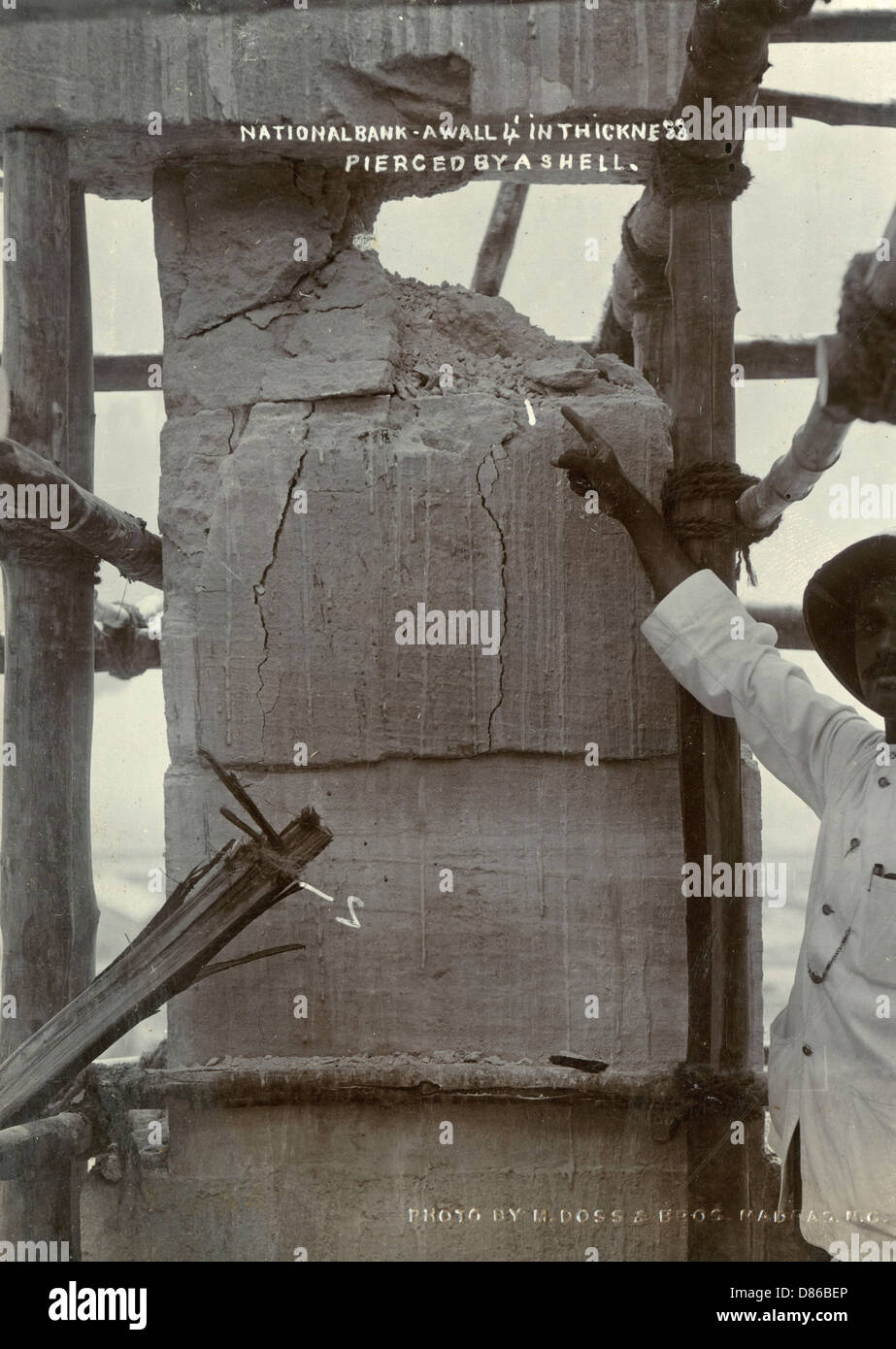 Wall pierced by shell Stock Photo - Alamy