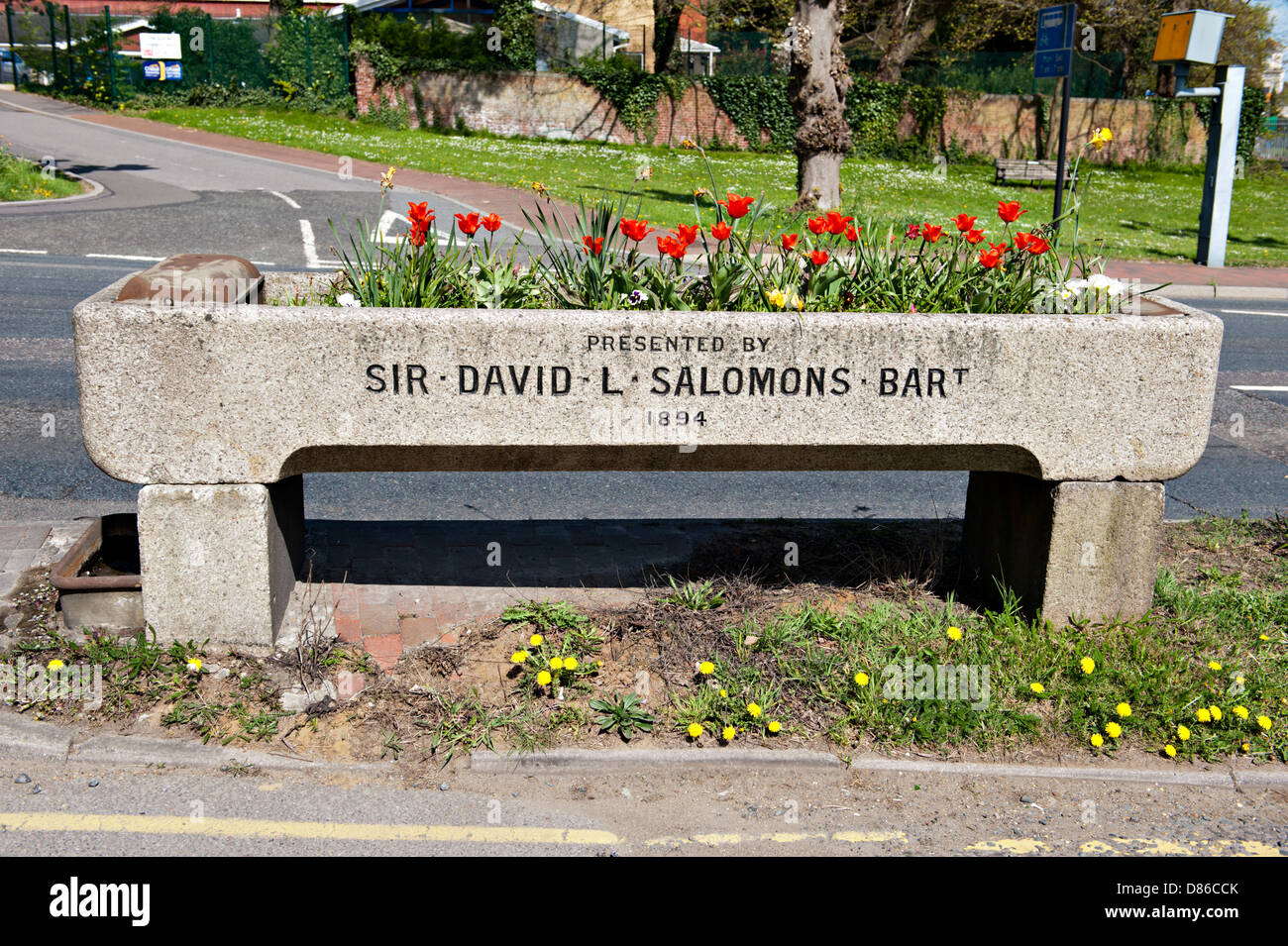 A victorian cattle trough now used for floral display Stock Photo - Alamy
