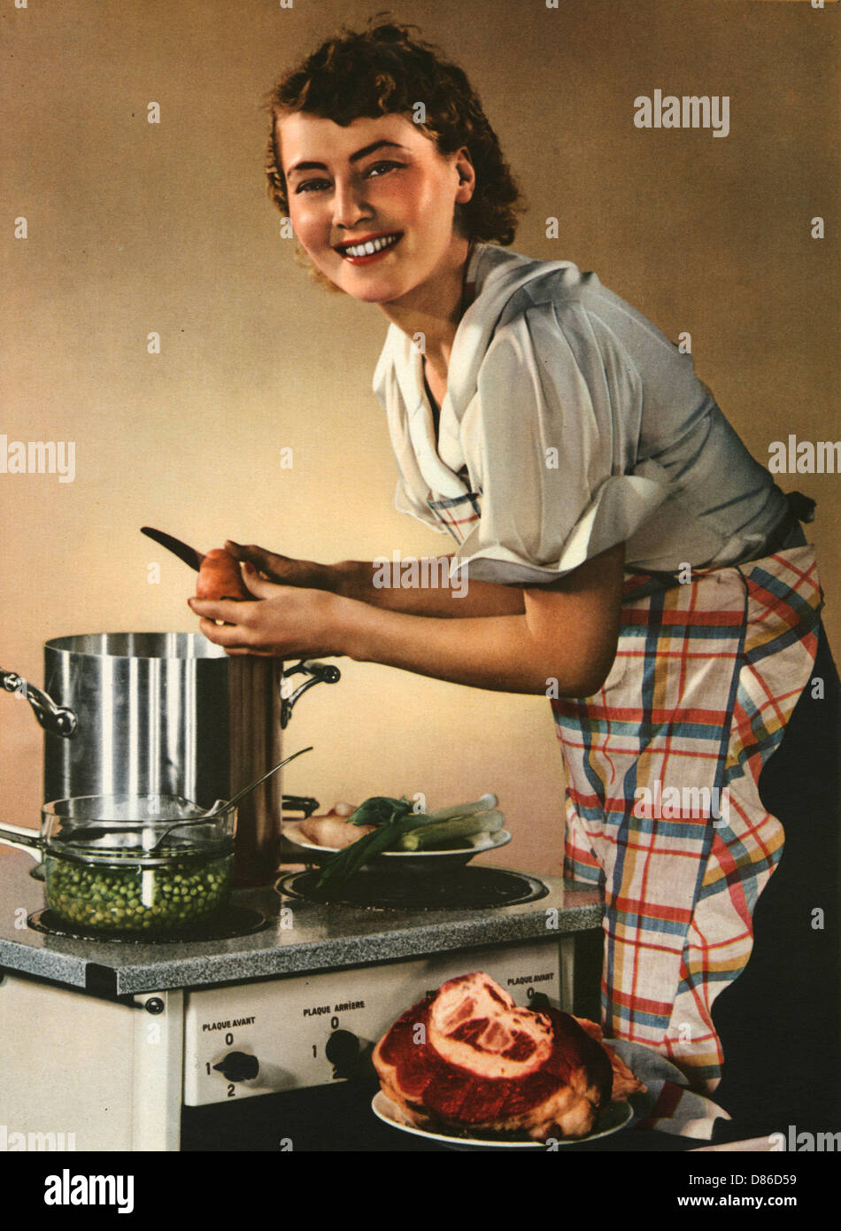Woman 1930s cooking hi-res stock photography and images - Alamy