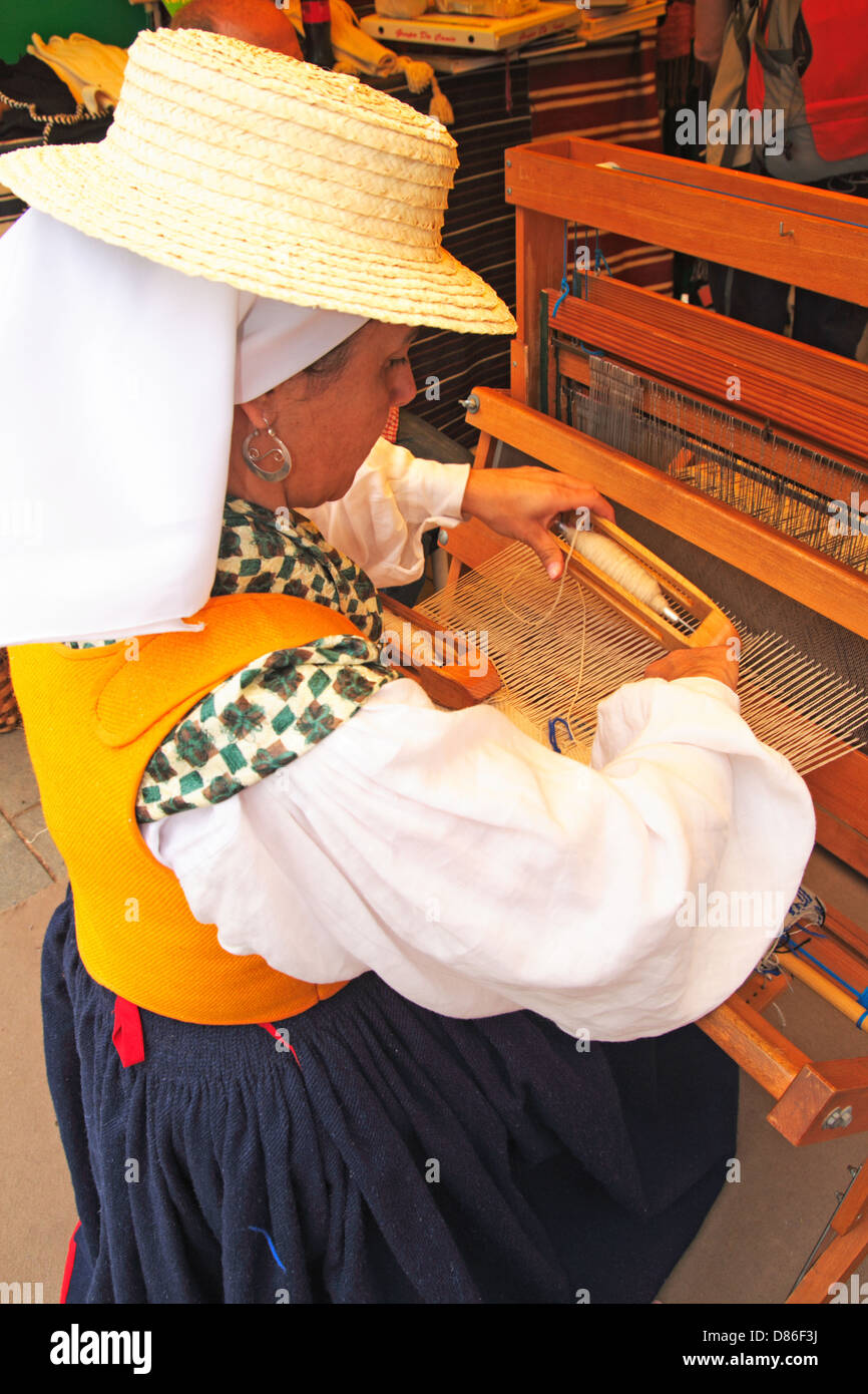 female weaver from the canaries working with a loom Stock Photo - Alamy