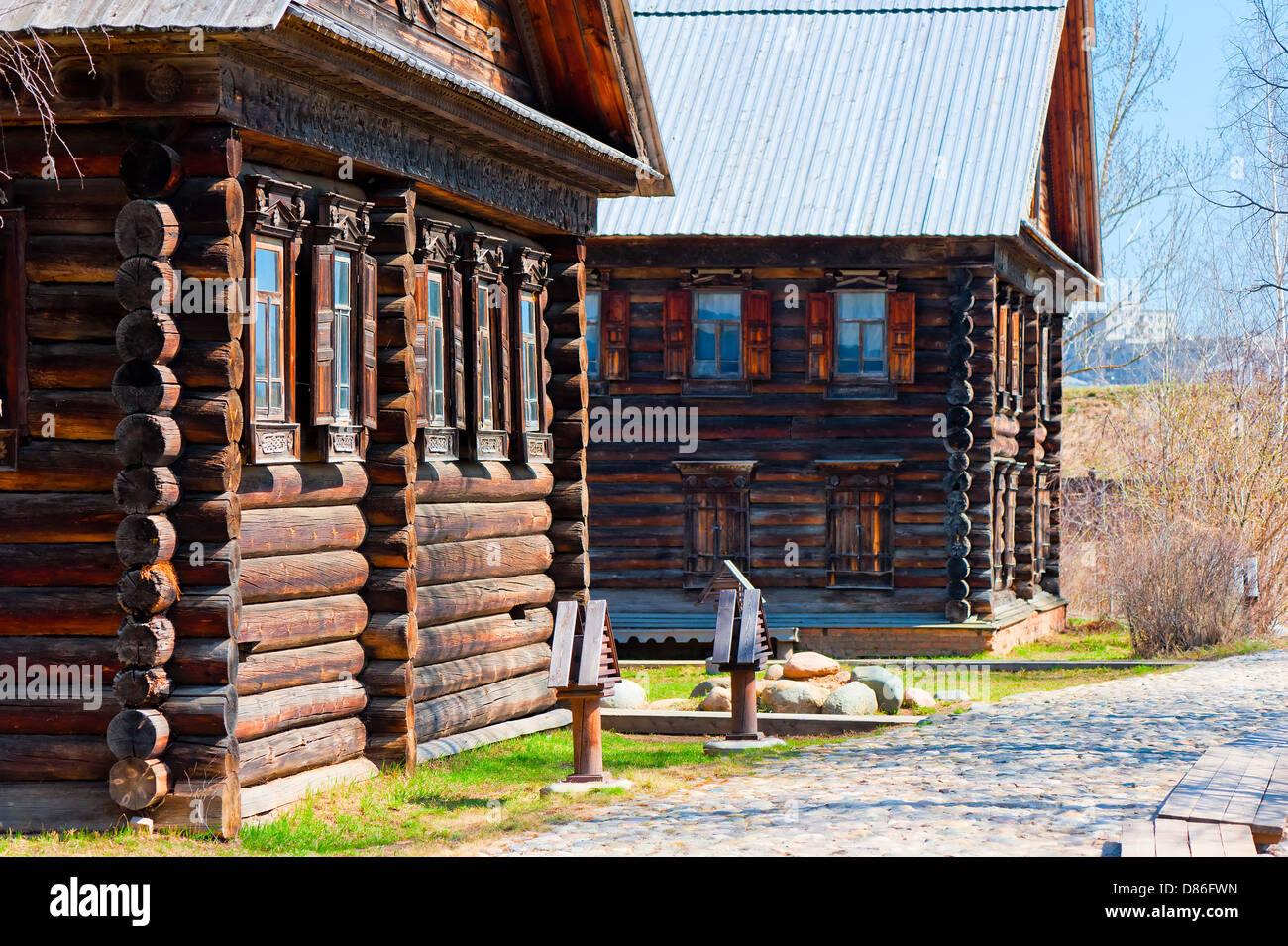 Facades Russian village of wooden houses Stock Photo - Alamy