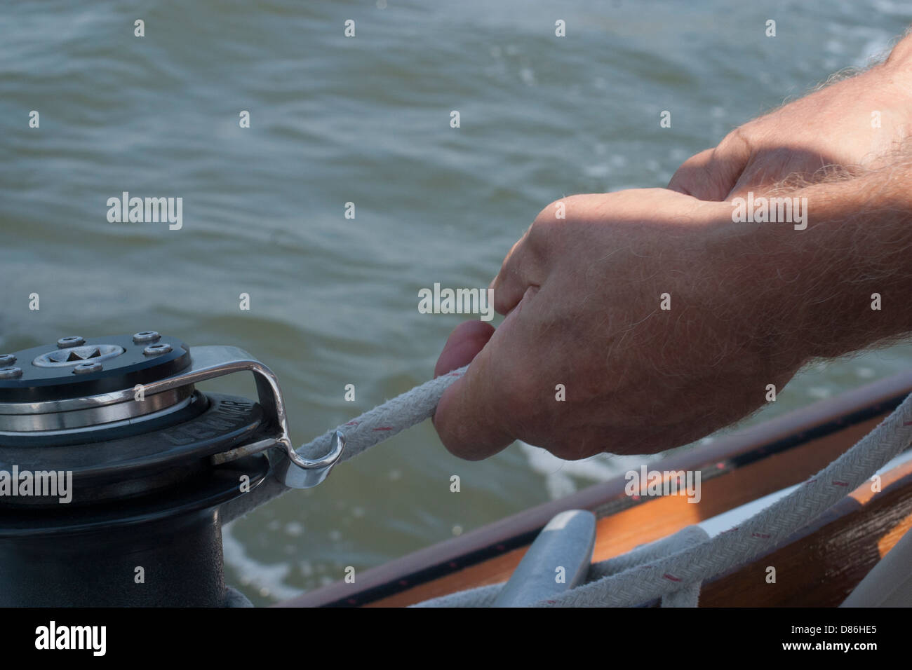 Man hauling in sail hi-res stock photography and images - Alamy