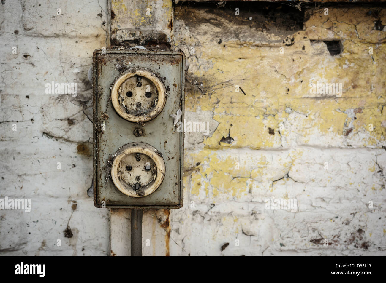 Old electric plug in abandoned building Stock Photo - Alamy