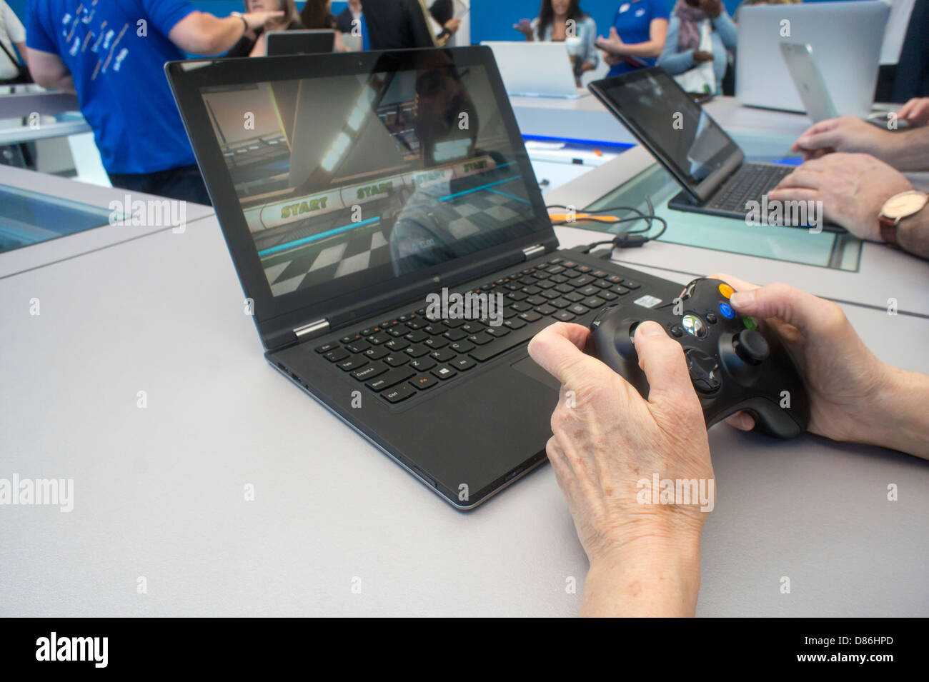 Visitors at the Experience Intel: Look Inside pop-up "shop" in the ...