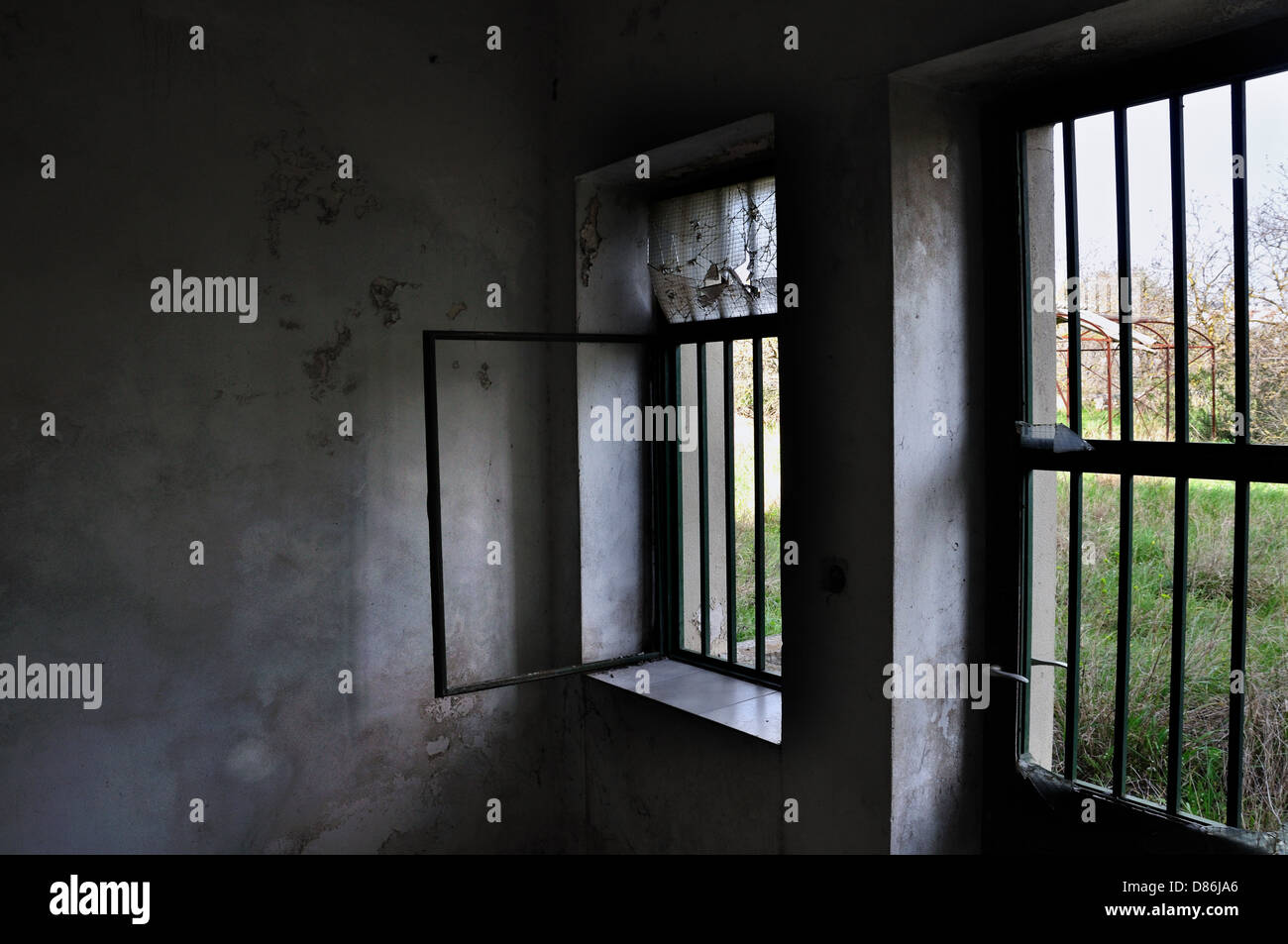 Barred door and windows in abandoned house interior Stock Photo - Alamy