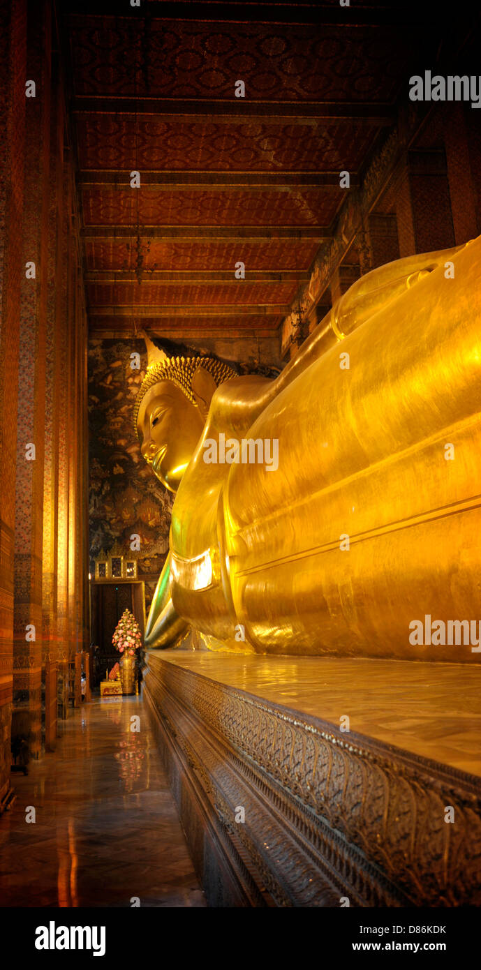 The reclining buddha at Wat Pho, one of the largest and oldest temples ...