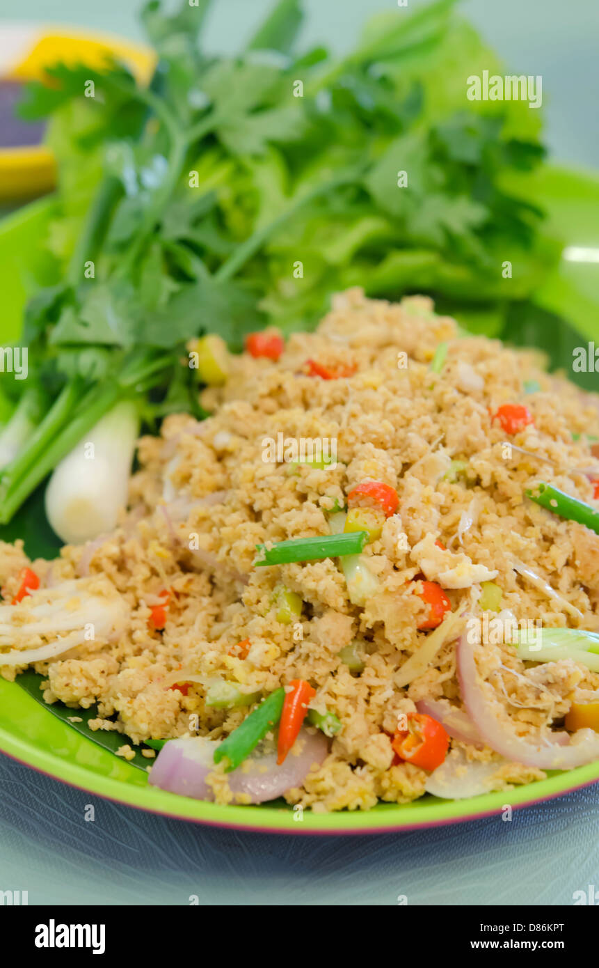 close up fish roe with mix vegetable, served with fresh green vegetable ...
