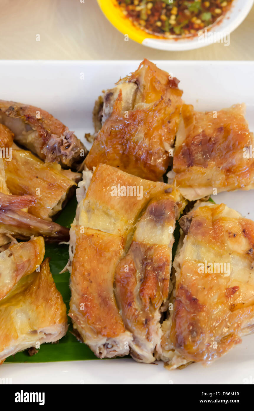 top view grilled chicken on white plate, served with chili sauce Stock ...