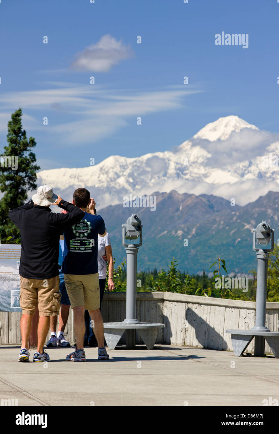 Tourists view Alaska Range & Denali Mountain (Mt. McKinley) from ...