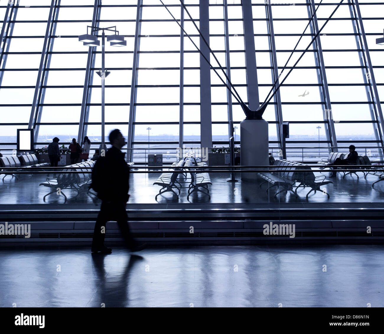 business people walking in airport departure hall,pudong airport ...