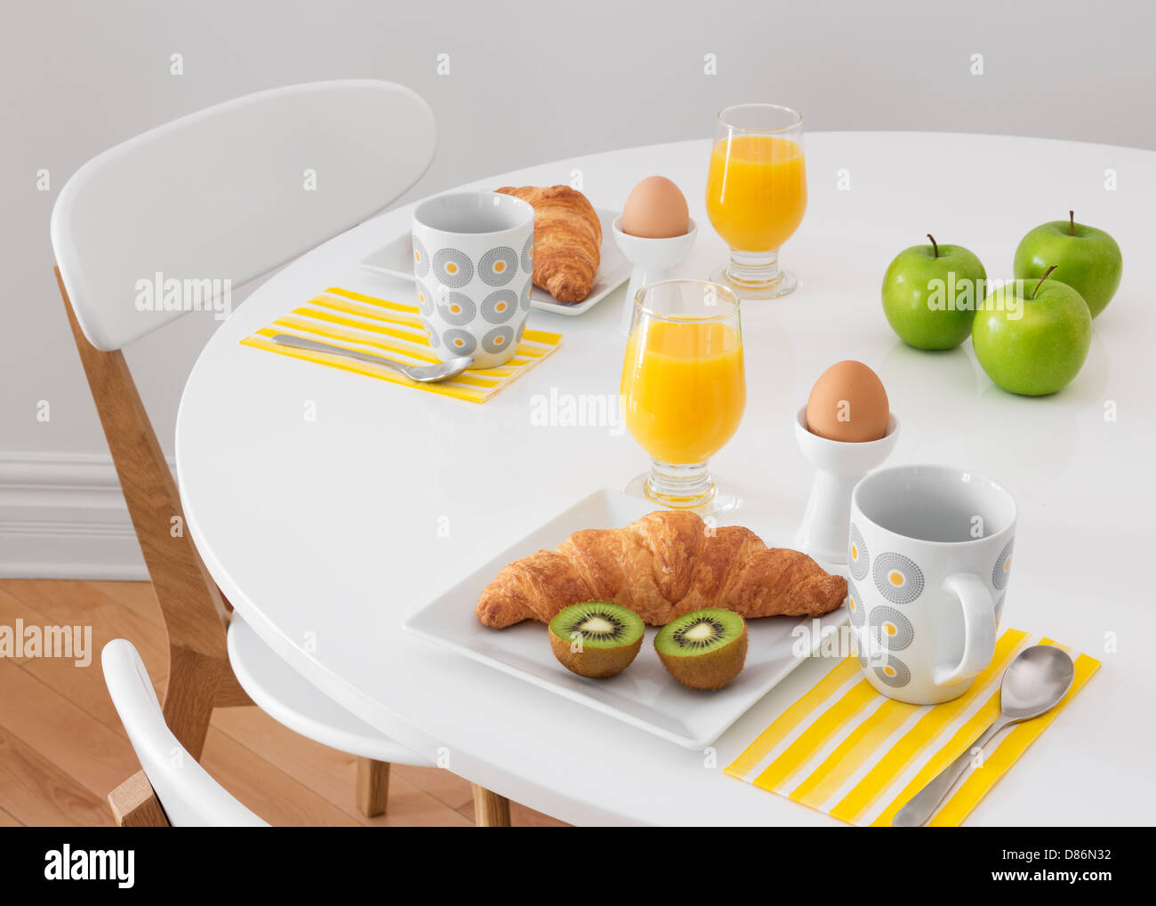 White round table with simple healthy breakfast Stock Photo - Alamy