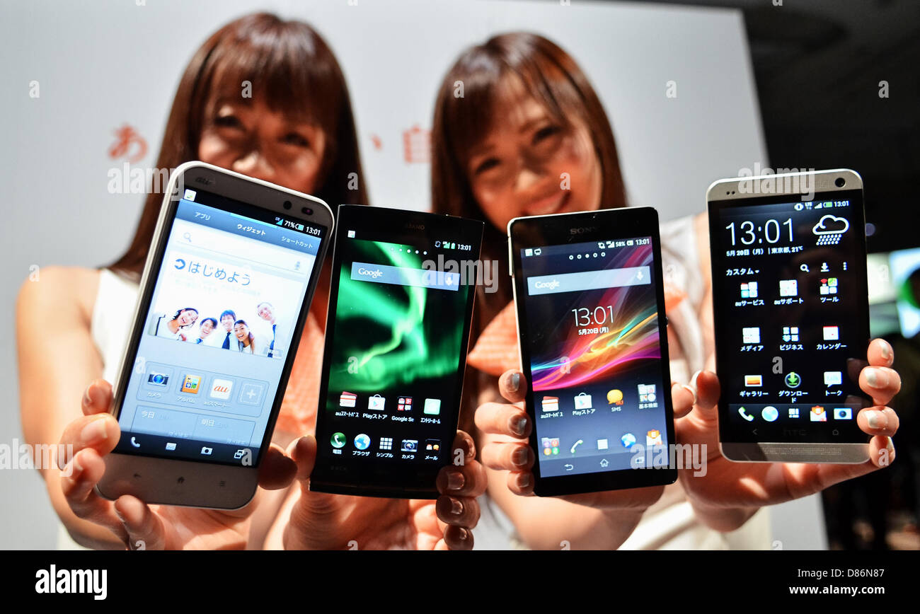 May 20, 2013, Tokyo, Japan : Models show new summer lineups (L-R) Sharp ...