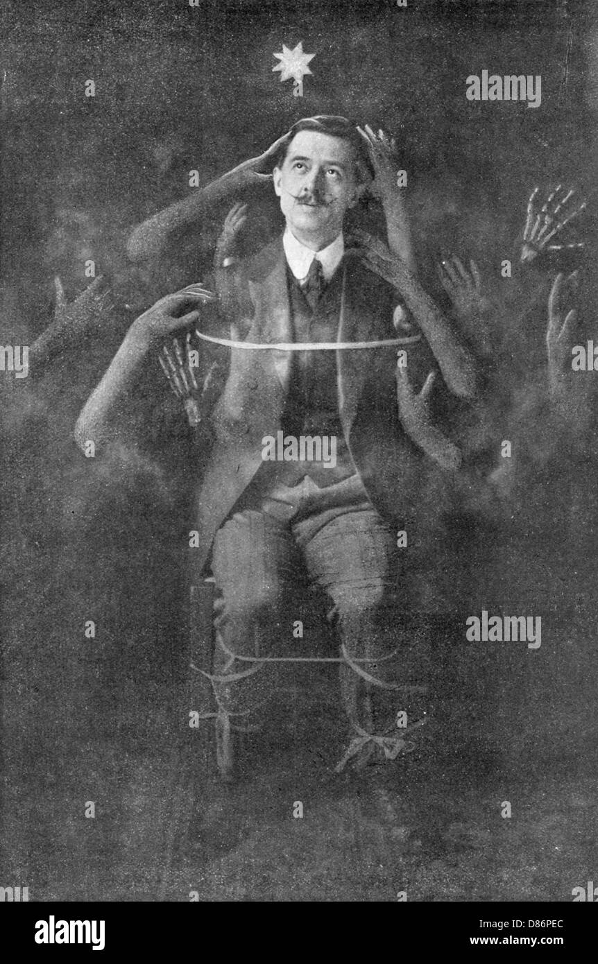 Paranormal: William S. Marriott simulates spirit hands Stock Photo - Alamy