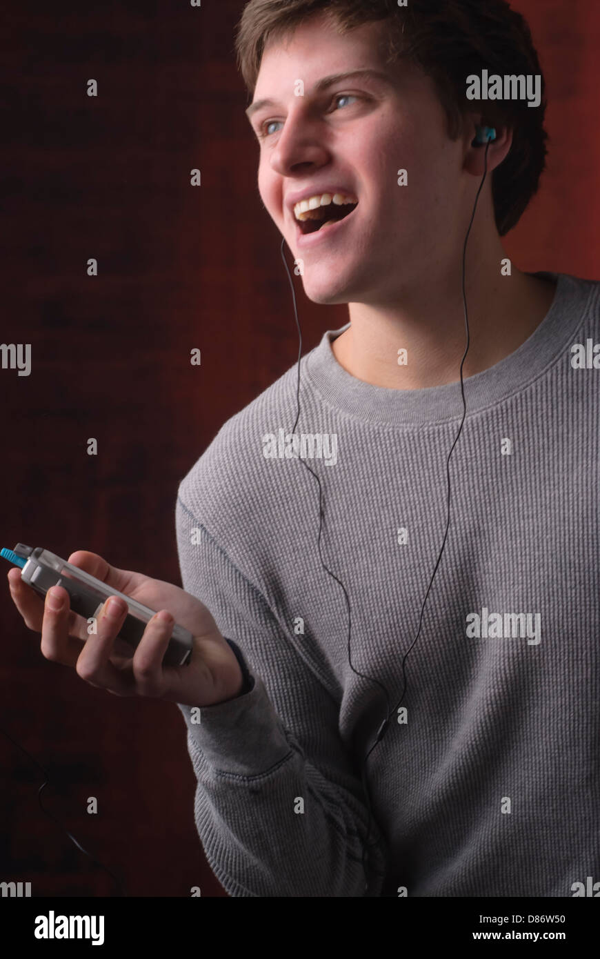 Singing into iphone hi-res stock photography and images - Alamy