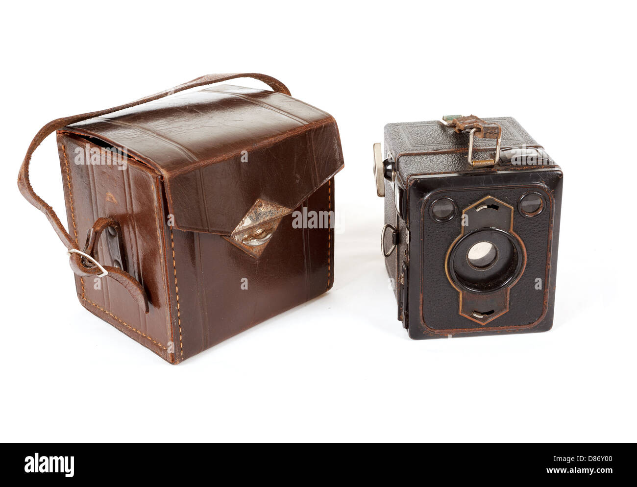 very old vintage camera isolated on white background with transporting ...