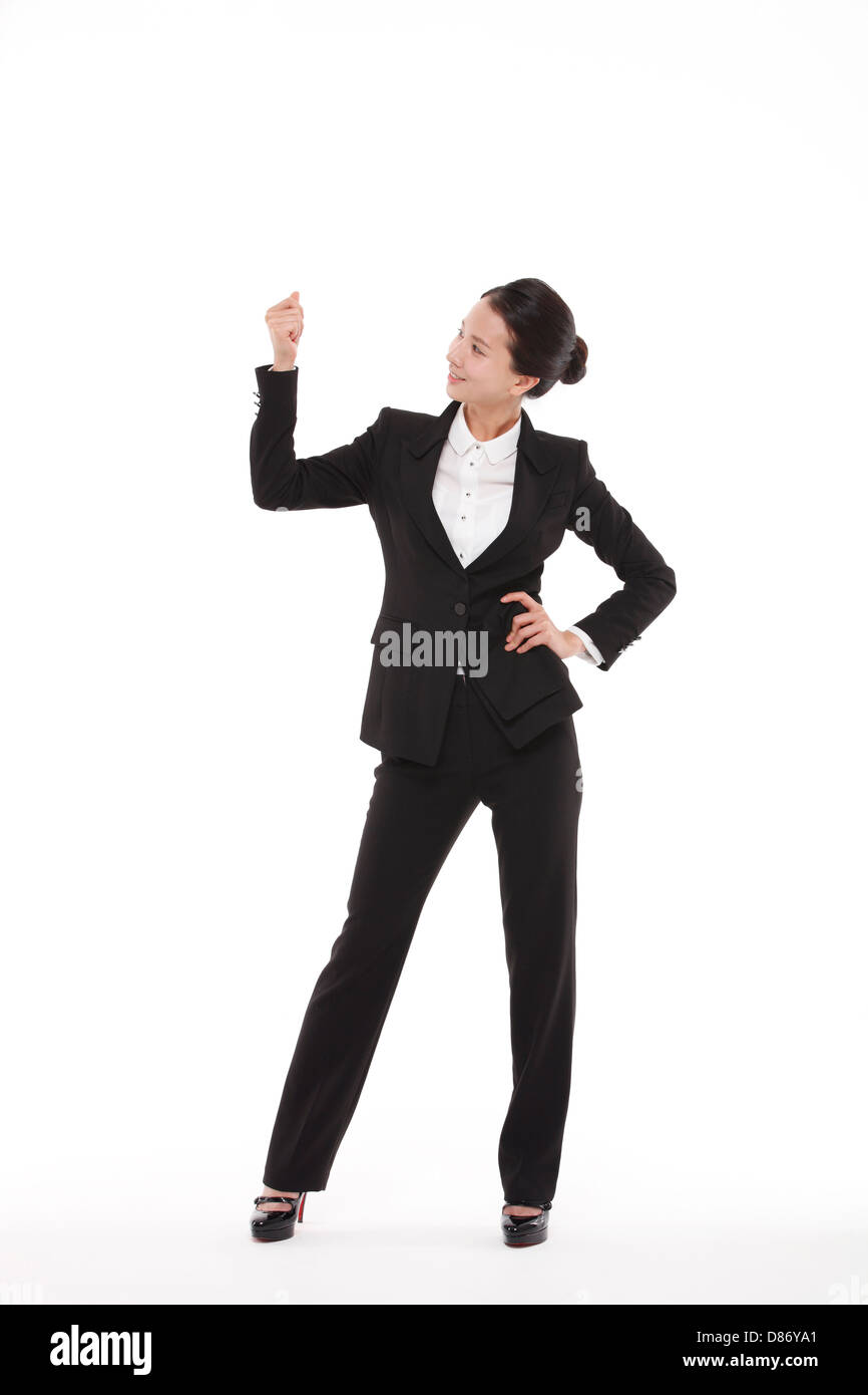 young businesswoman posing in studio Stock Photo - Alamy