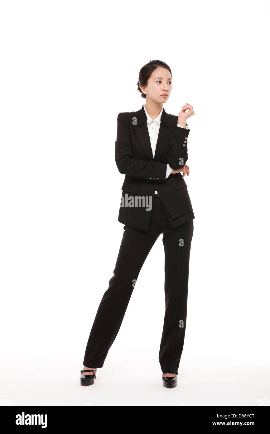 young businesswoman posing in studio Stock Photo - Alamy
