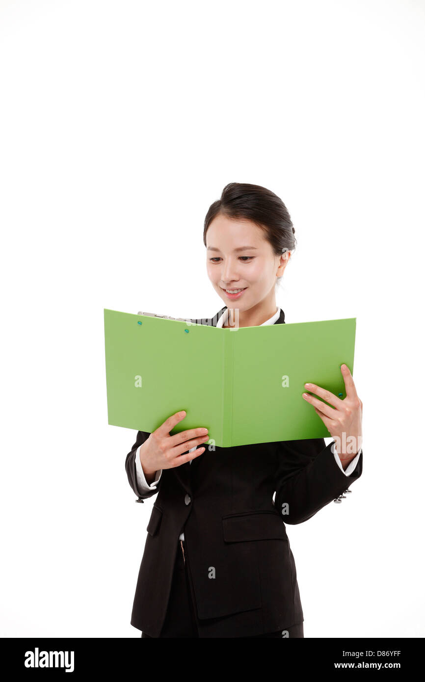 young woman posing in studio binder Stock Photo - Alamy