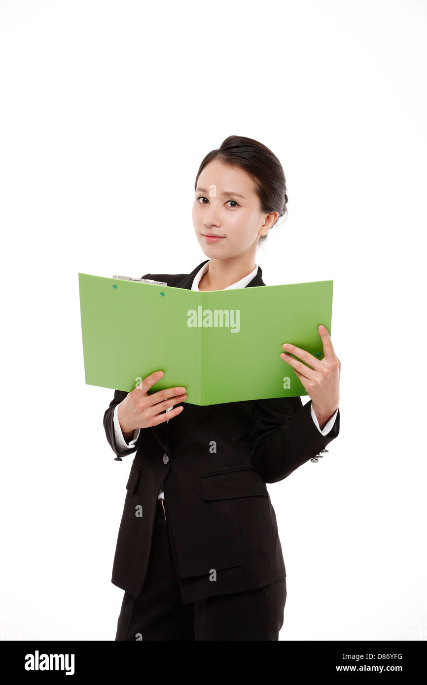 young woman posing in studio binder Stock Photo - Alamy