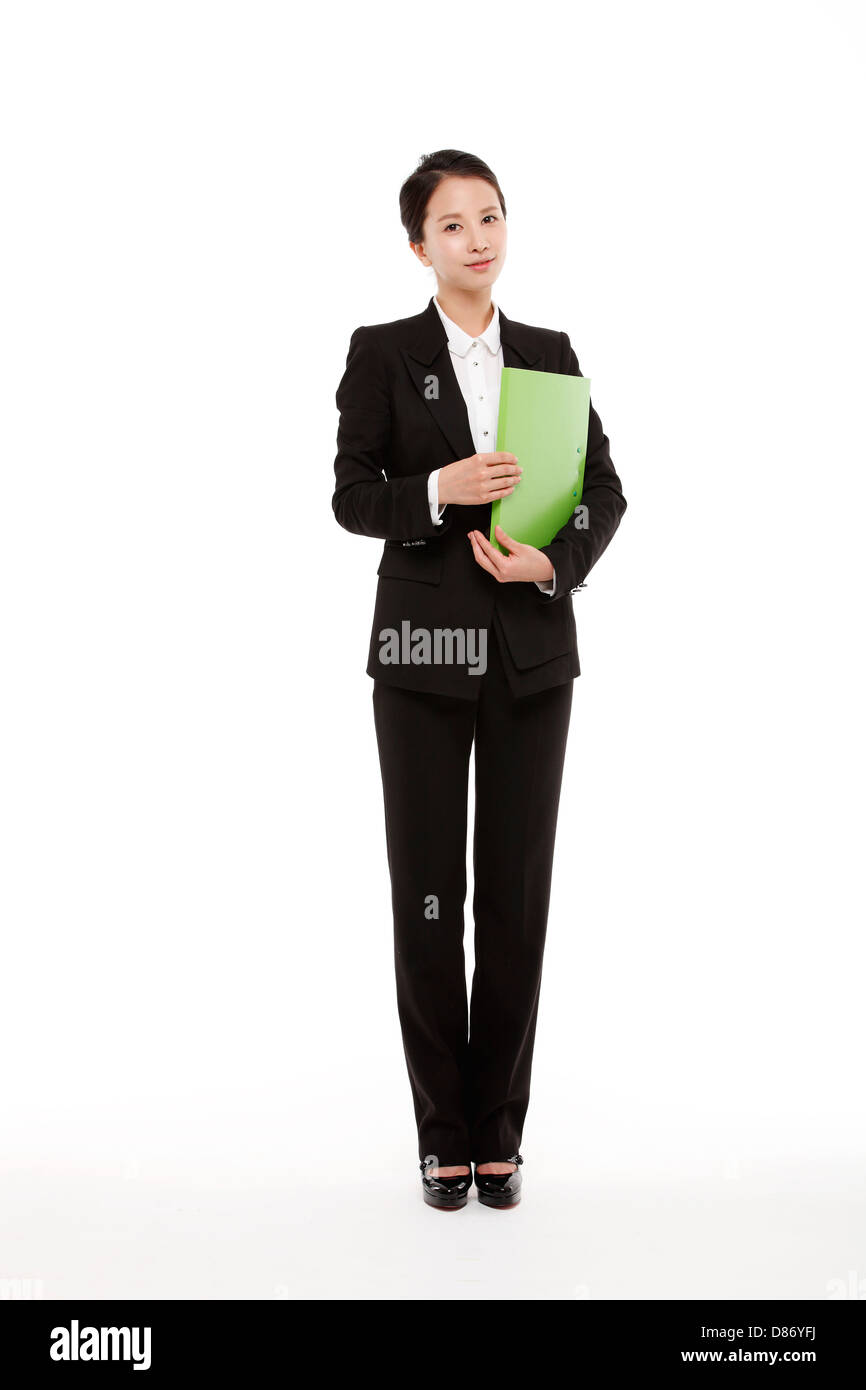 young woman posing in studio binder Stock Photo - Alamy