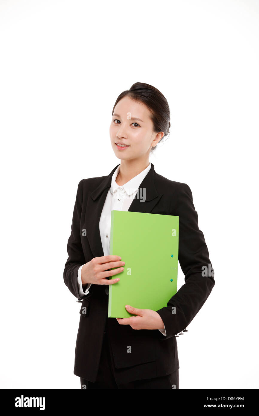 young woman posing in studio binder Stock Photo - Alamy