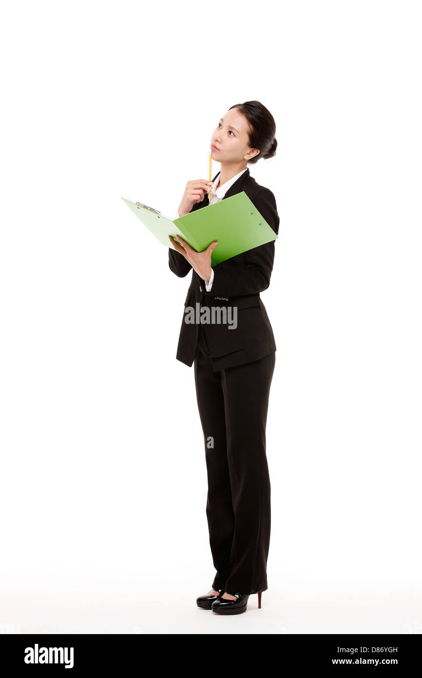young woman posing in studio binder Stock Photo - Alamy