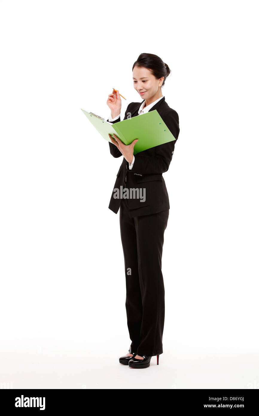 young woman posing in studio binder Stock Photo - Alamy