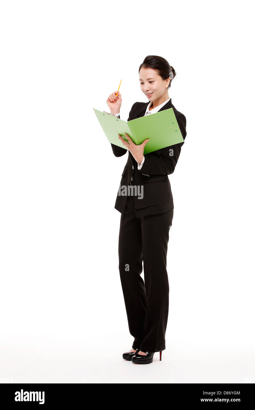 young woman posing in studio binder Stock Photo - Alamy